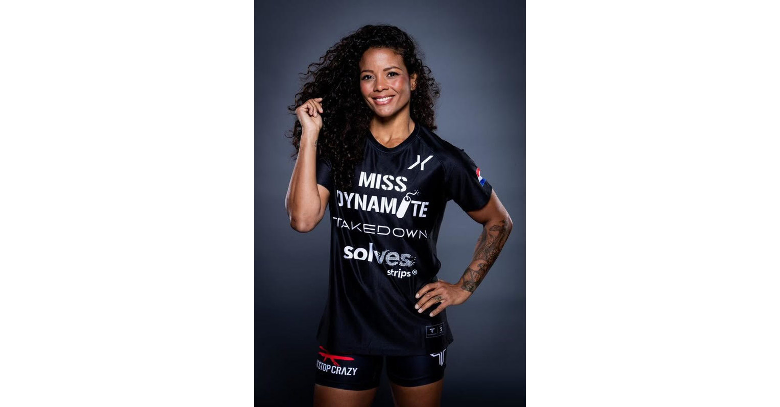 Solves Strips® in 'Miss Dynamite' Denise Kielholtz's Corner for Title Fight