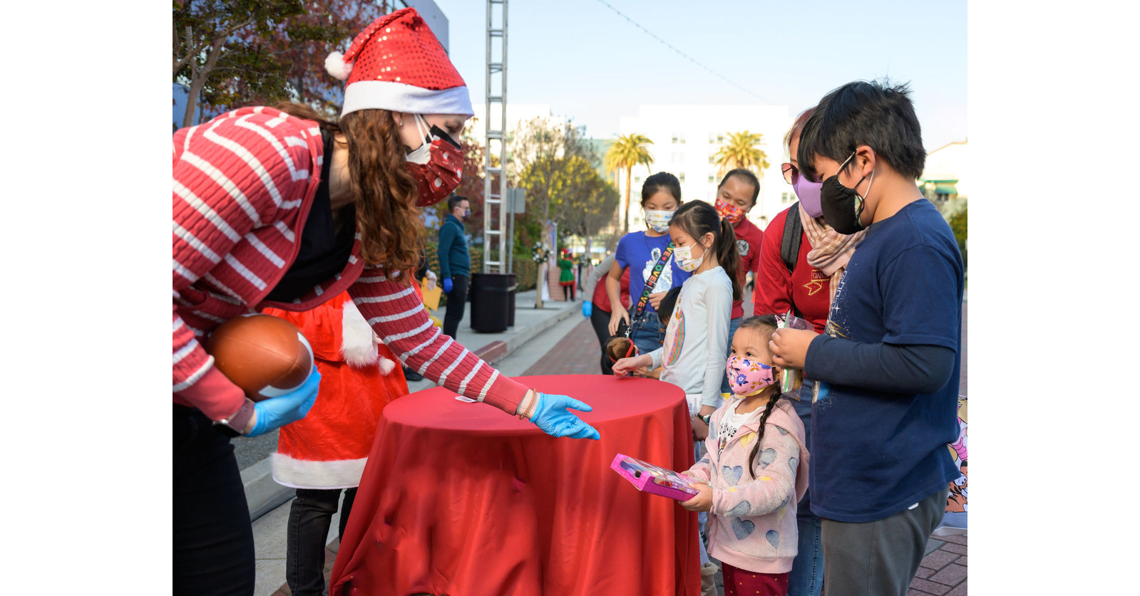 7,000 Christmas Gifts Handed Out at the Candy Cane Lane Toy Giveaway at ...