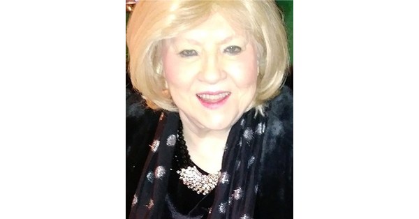 Georgia Lou Huff is being recognized by Continental Who's Who