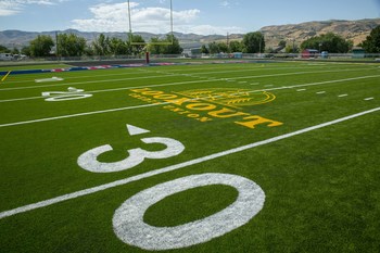 HELLAS HAS POCATELLO THUNDERING AHEAD AT "POKY STADIUM"