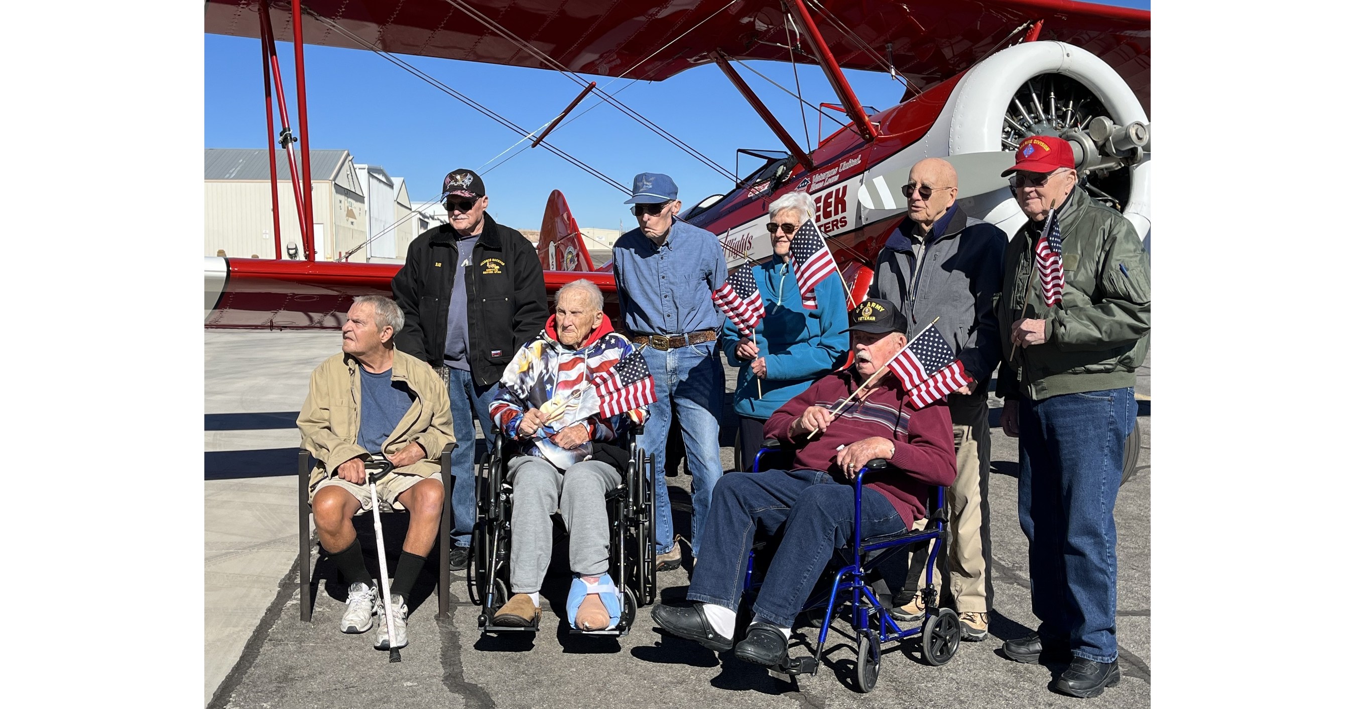93 yr old veteran in hospice care honored with flight in WWII-era biplane