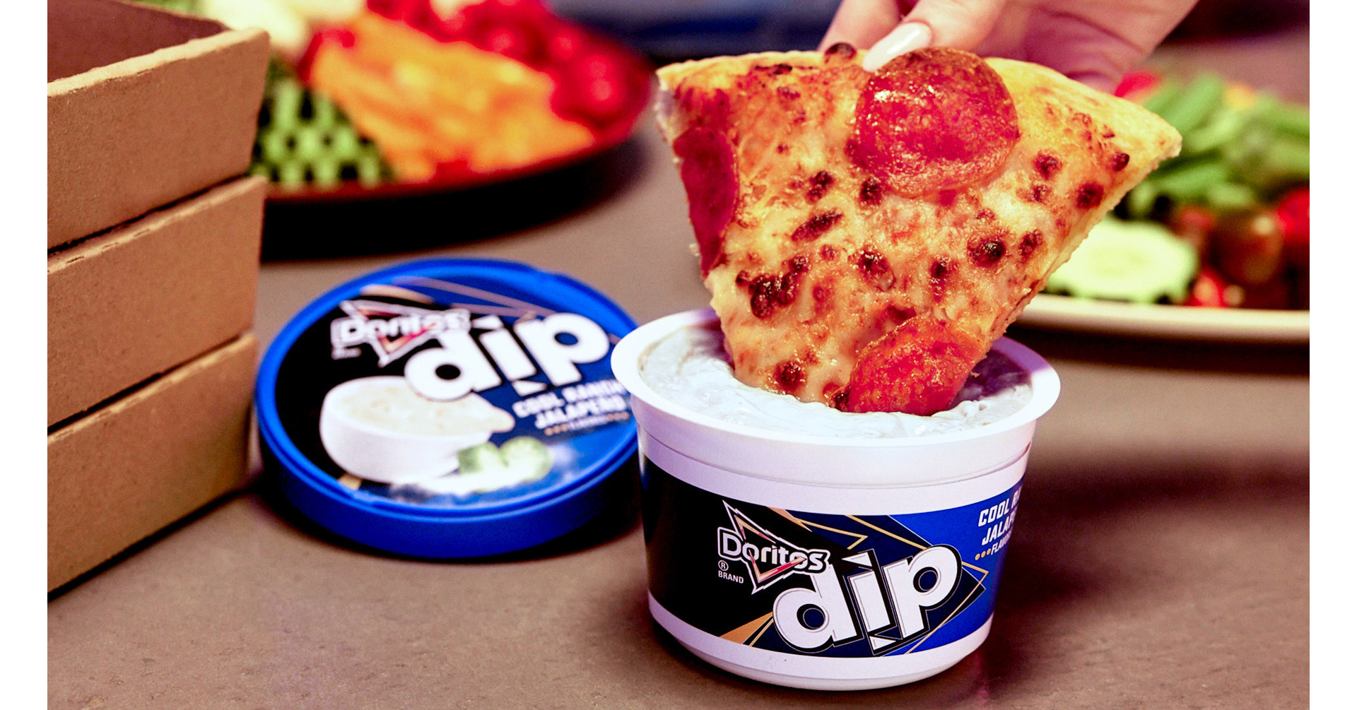 DORITOS® SERVES UP "BIG DIP ENERGY" TO INTRODUCE DORITOS® DIPS