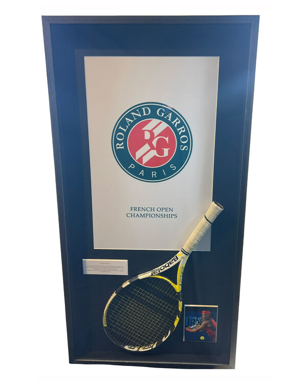 Rafael Nadal's Historic French Open Racket Expected to Auction for ...