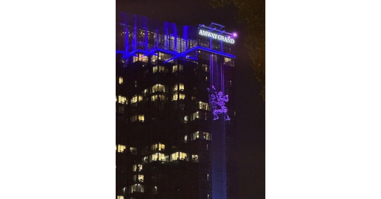 35-Foot Illuminated Puppet Scales the Amway Grand Plaza in Grand Rapids ...