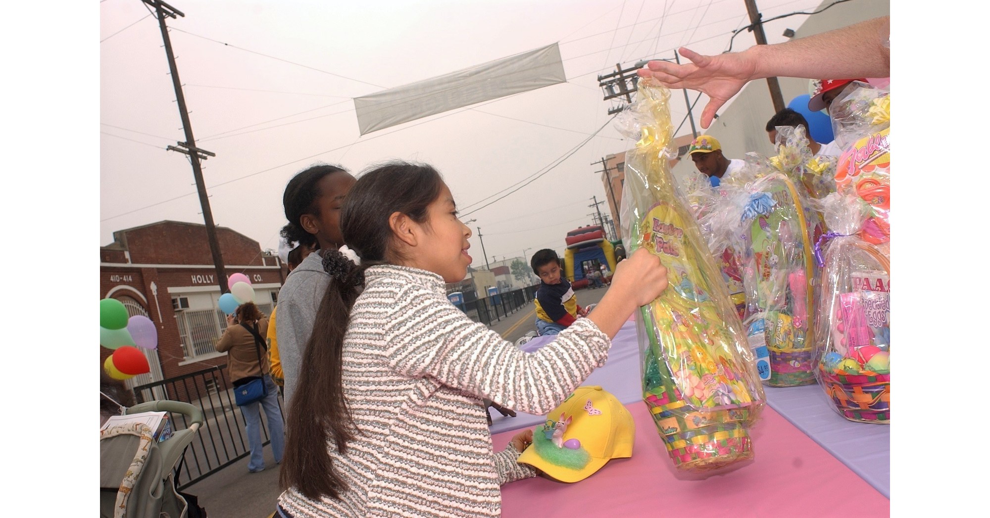 Easter Bunny & Volunteers Prepare 700 Easter Baskets Filled With Toys ...