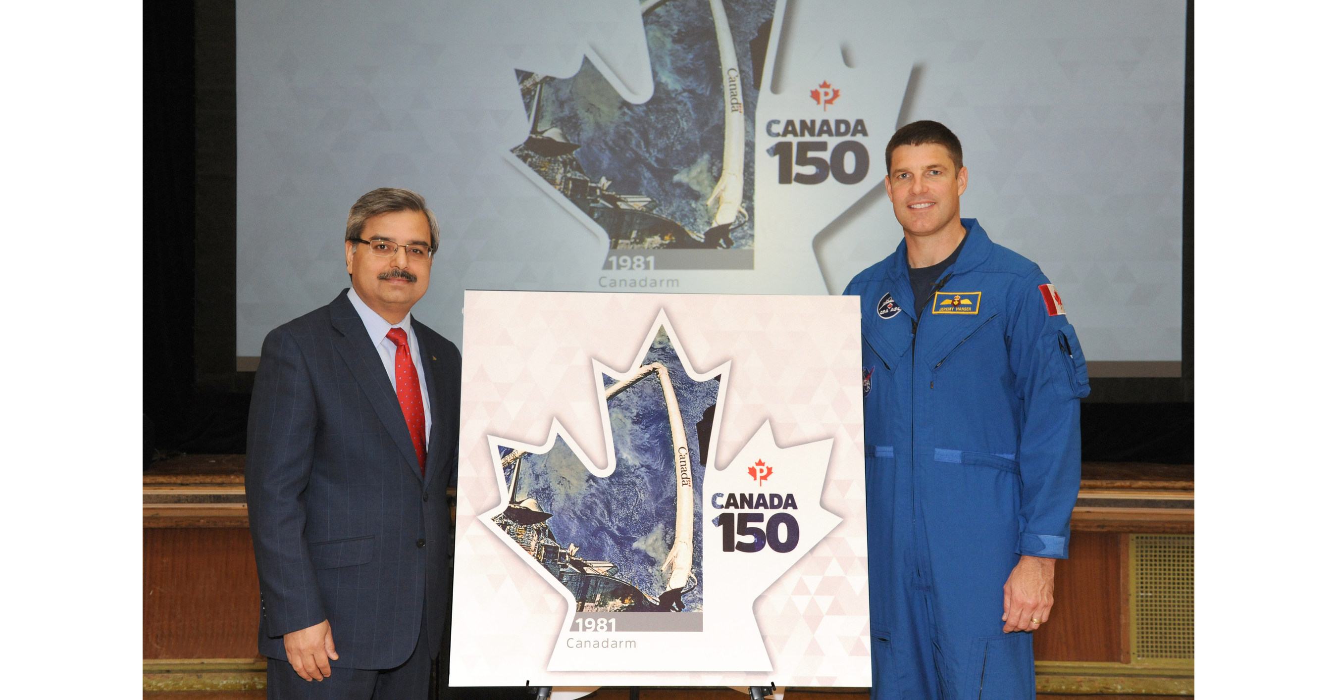 Canadian astronaut Jeremy Hansen unveils Canadarm stamp at Toronto school