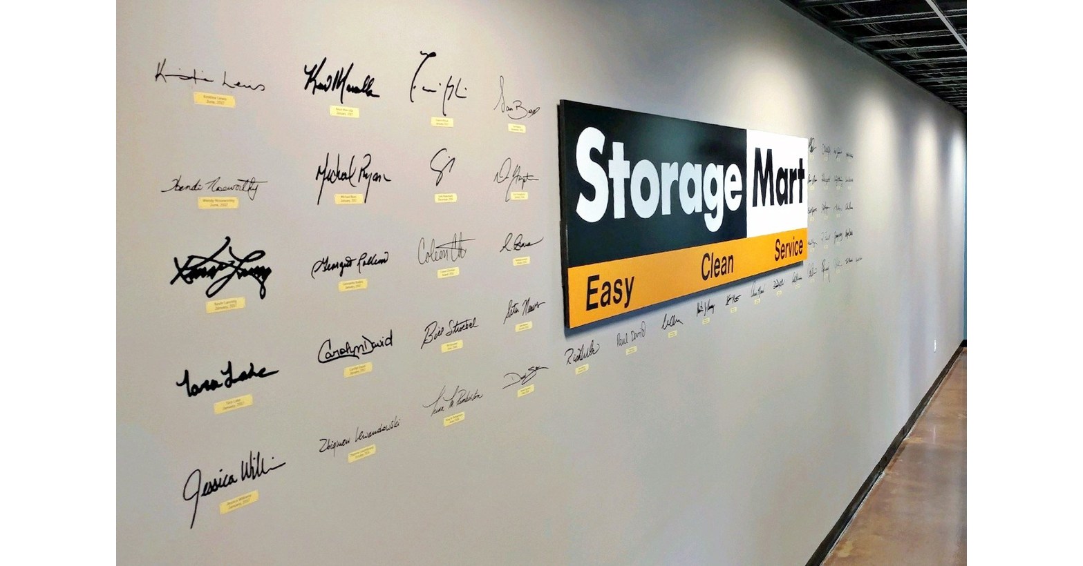 StorageMart Wall of Fame Awarded to Colchester, England Team