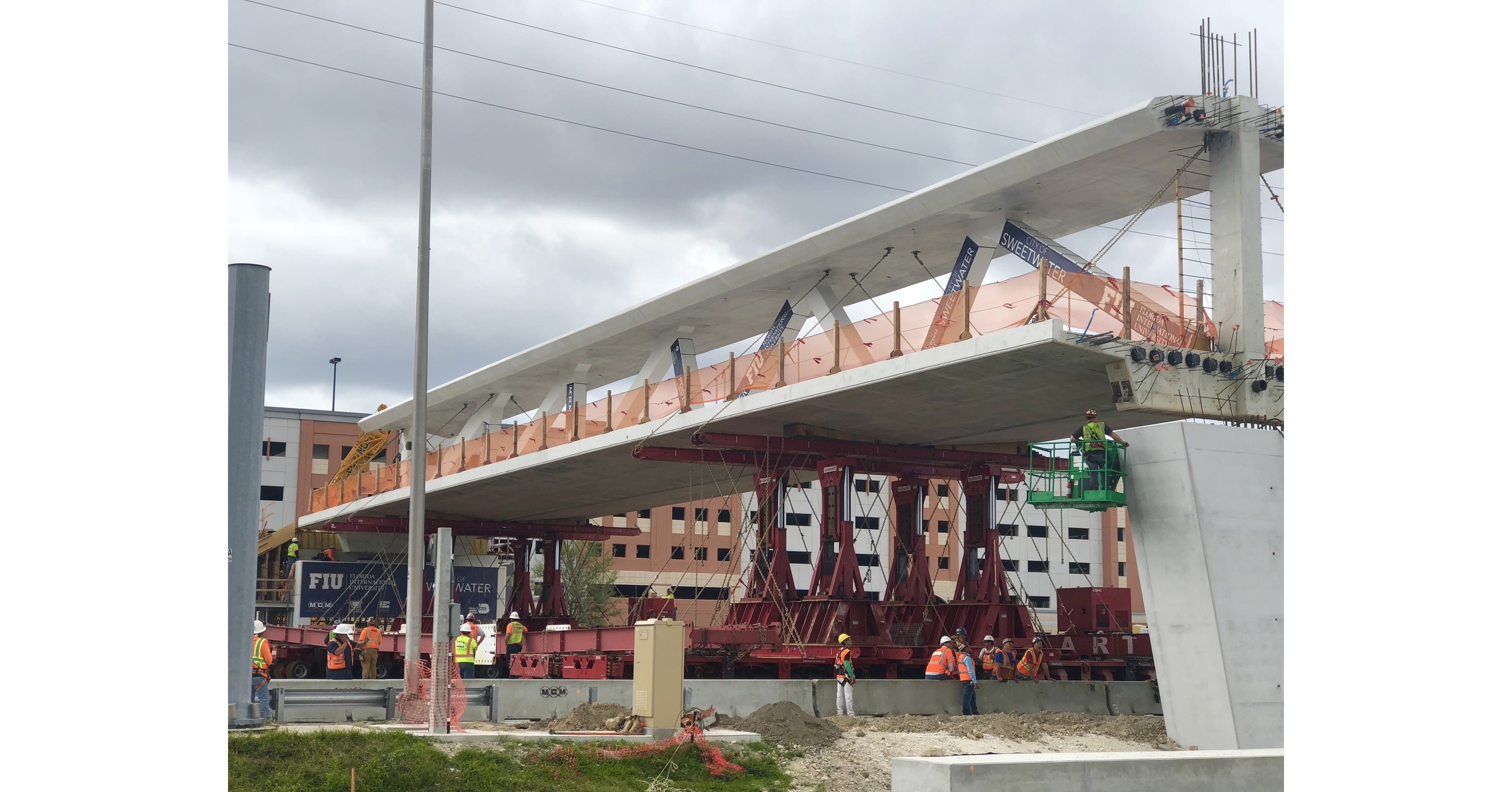 First-of-its-kind pedestrian bridge "swings" into place