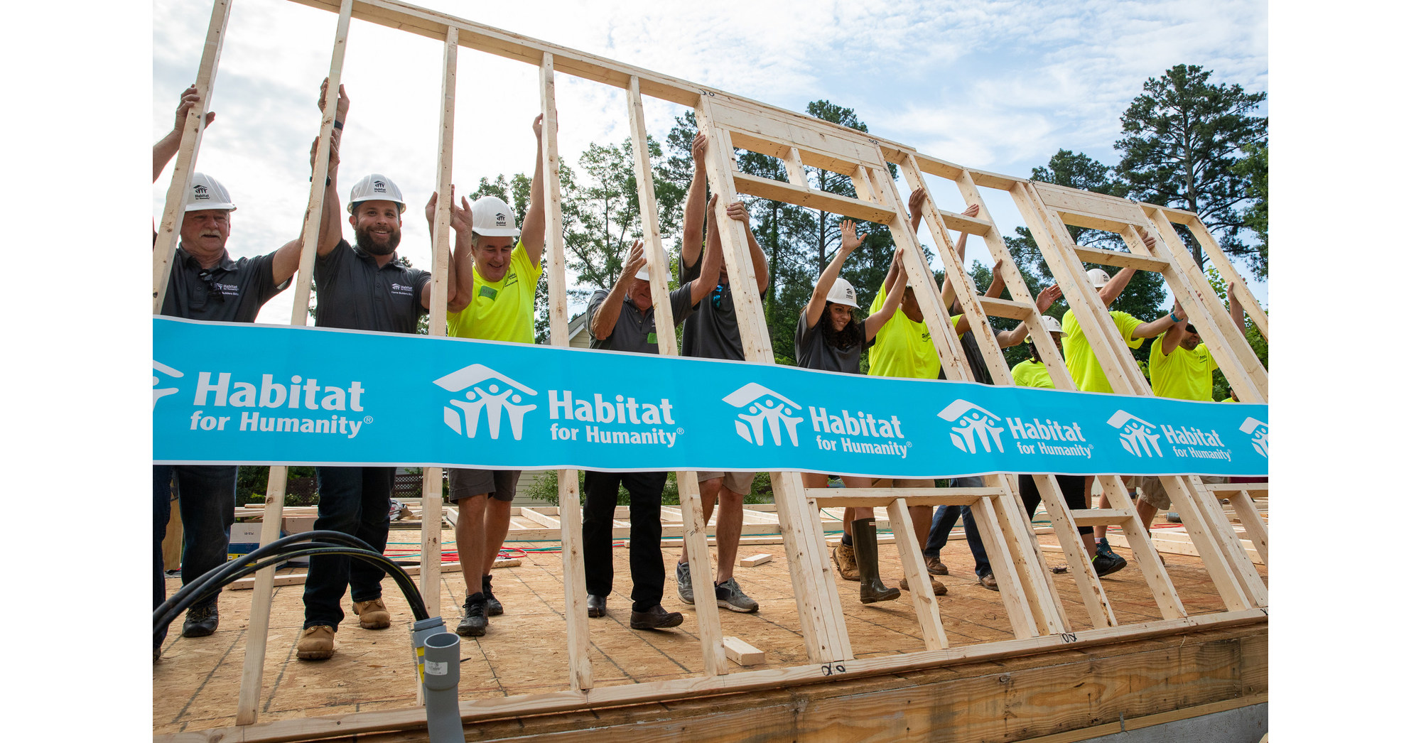 Professional home builders and suppliers clocked in with Habitat for ...