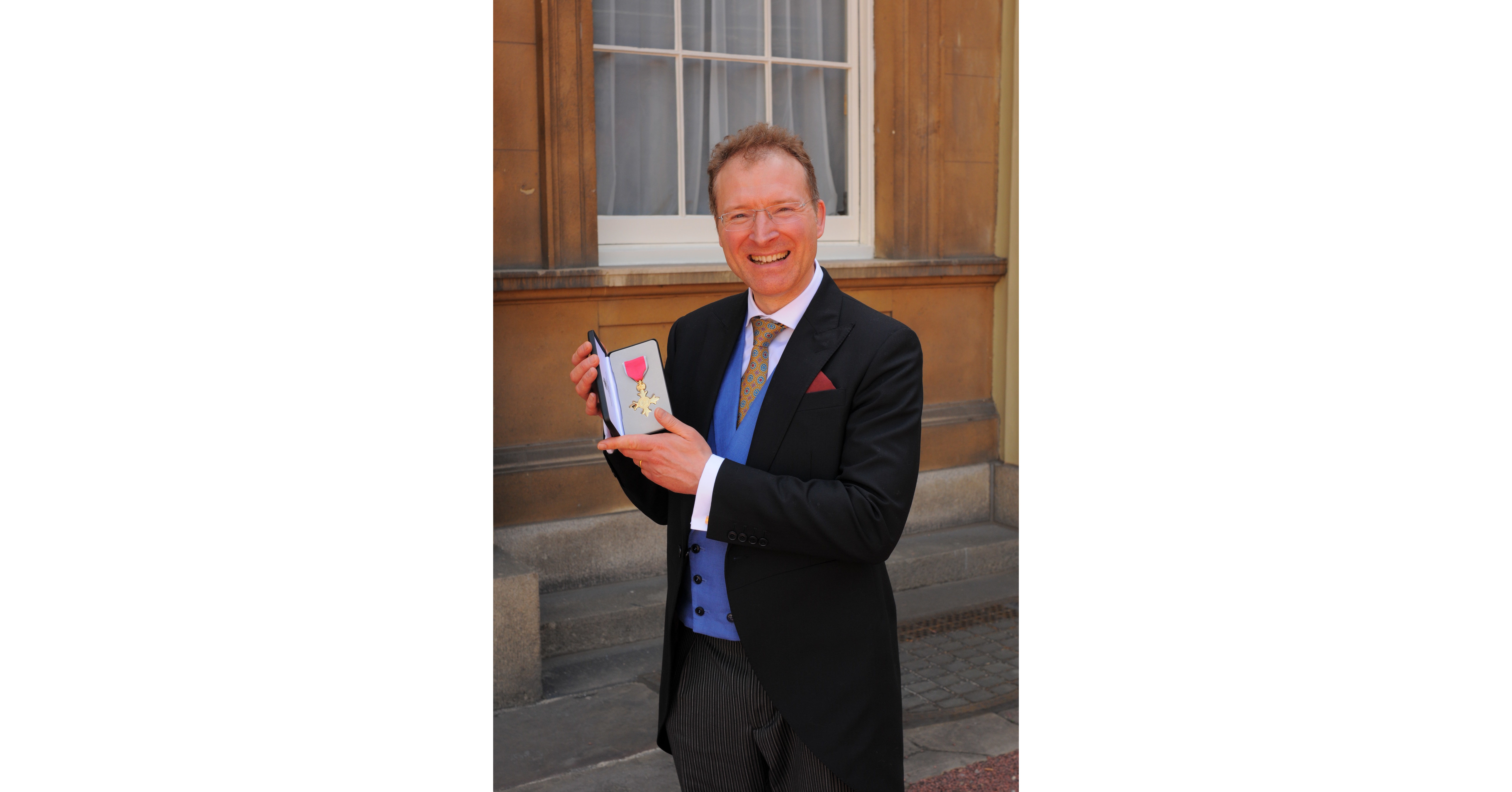 OBE Investiture of TIGA's CEO Dr Richard Wilson Held at Buckingham Palace