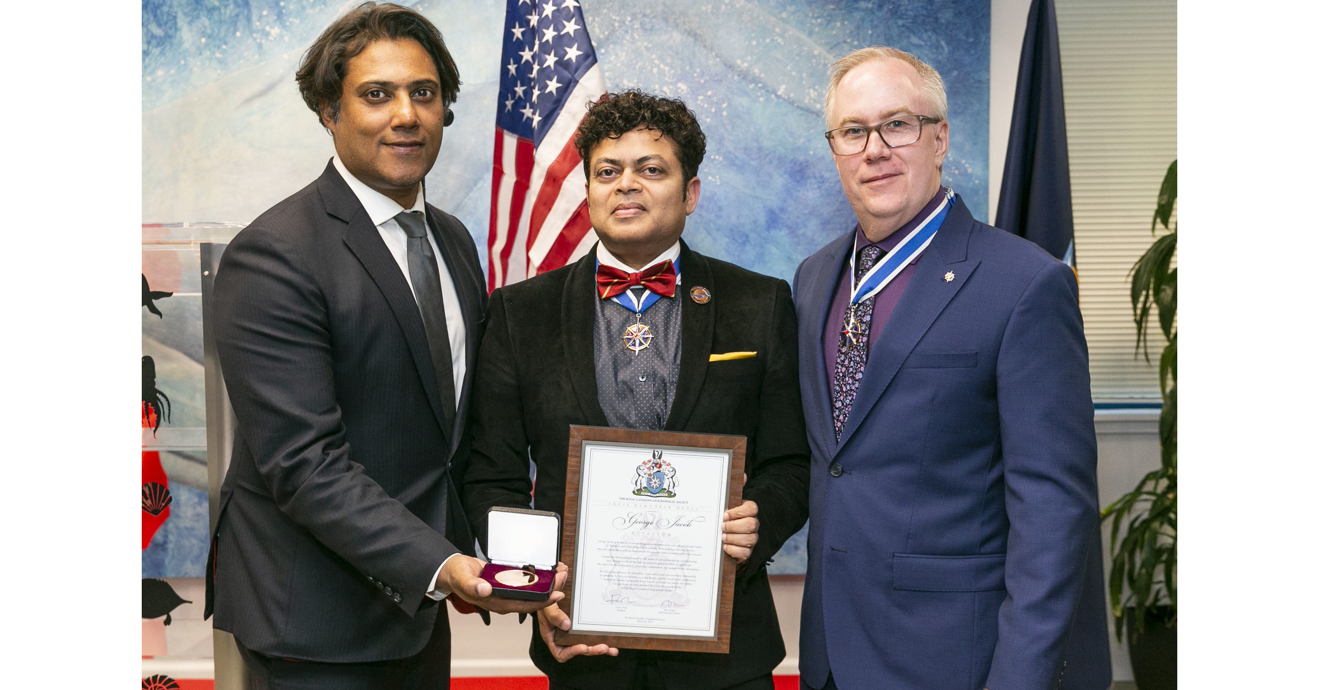 George Jacob, President & CEO of Aquarium of the Bay, receives ...