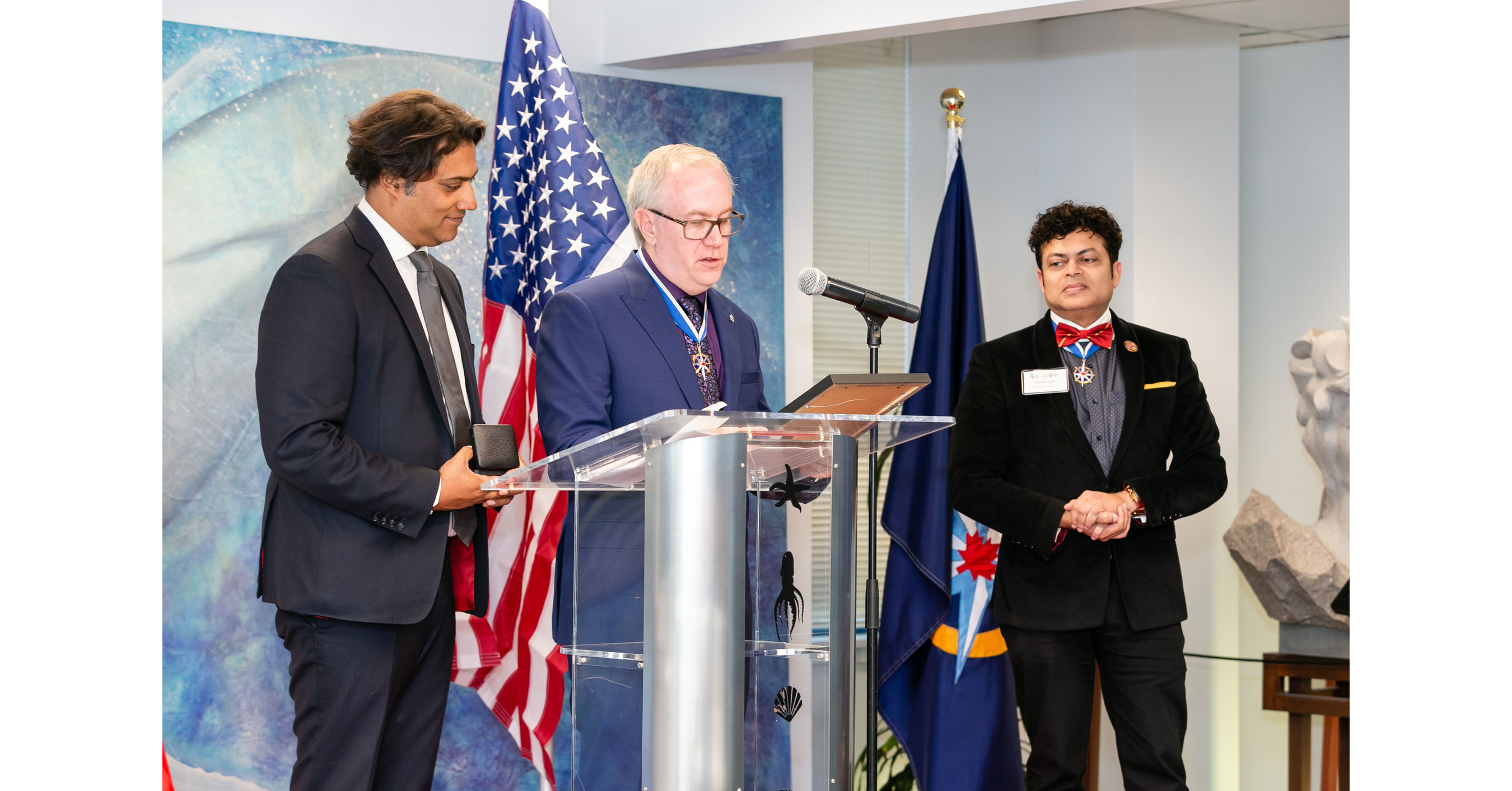 George Jacob, President & CEO of Aquarium of the Bay, receives ...